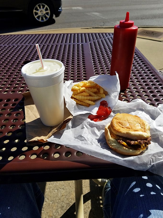 The outdoor dining area at Wally's transforms ordinary meals into community gatherings under the Midwestern sun.