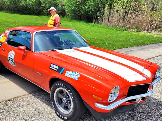 This 1970 Camaro looks ready to growl down the highway, its orange racing stripes practically vibrating with stored energy.