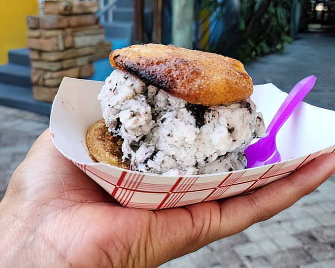 The legendary Churro Ice Cream Sandwich in its natural habitat. Warm, crispy churro meets cool, creamy filling in a dessert that defies conventional ice cream boundaries.