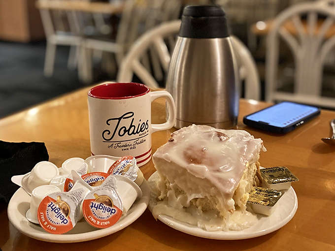 The perfect Minnesota morning: a steaming cup of coffee, a cinnamon roll the size of your face, and absolutely zero regrets.