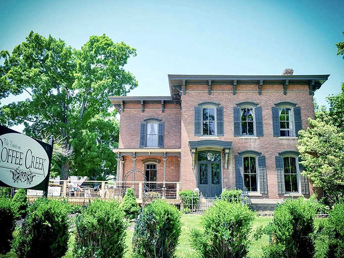 Coffee Creek's historic brick building stands as a testament to small-town charm. Its Italianate architecture whispers stories from another era.