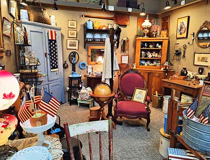 This booth feels like stepping into your eccentric great-uncle's study – complete with globe, vintage flags, and enough Americana to make a history teacher swoon.