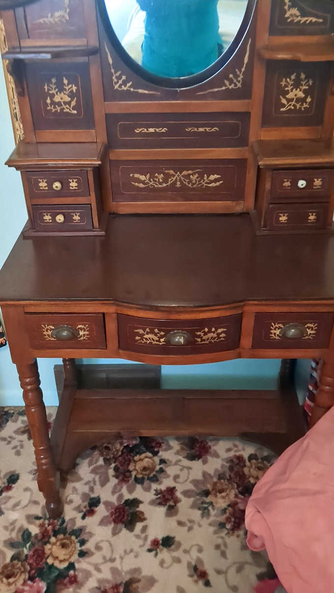 Imagine the faces that have gazed into this vanity mirror, applying lipstick and dreaming of adventures that now live only in memory.