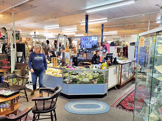 The checkout counter area serves as mission control for this time-traveling operation, where transactions feel more like passing treasures to their next caretakers than simple purchases.