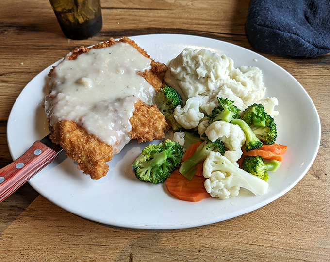 Golden-crisp exterior, juicy interior, and gravy that would make any Southern grandmother nod in silent approval.