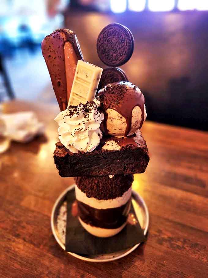 The "Death by Oreo" shake doesn't just contain cookies &ndash; it's practically wearing them as armor, with chocolate, cream, and cookie pieces creating a towering monument to indulgence.