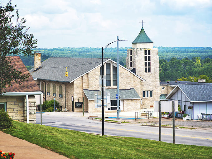 This charming church building serves as both spiritual center and community gathering place, its steeple reaching skyward like a local landmark.