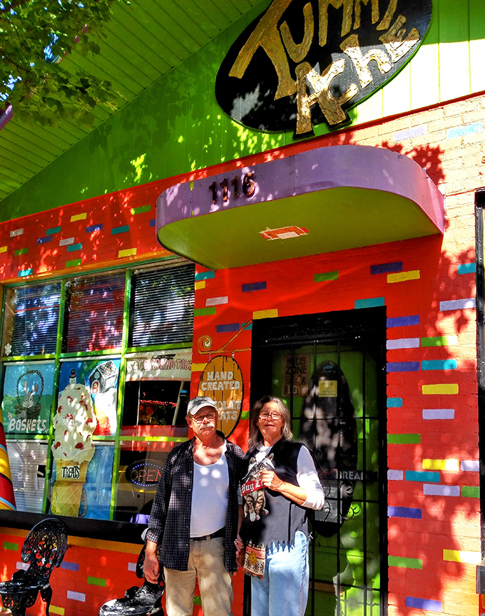 Young candy enthusiasts plotting their selections with the strategic precision of chess grandmasters &ndash; sweet decisions are serious business.