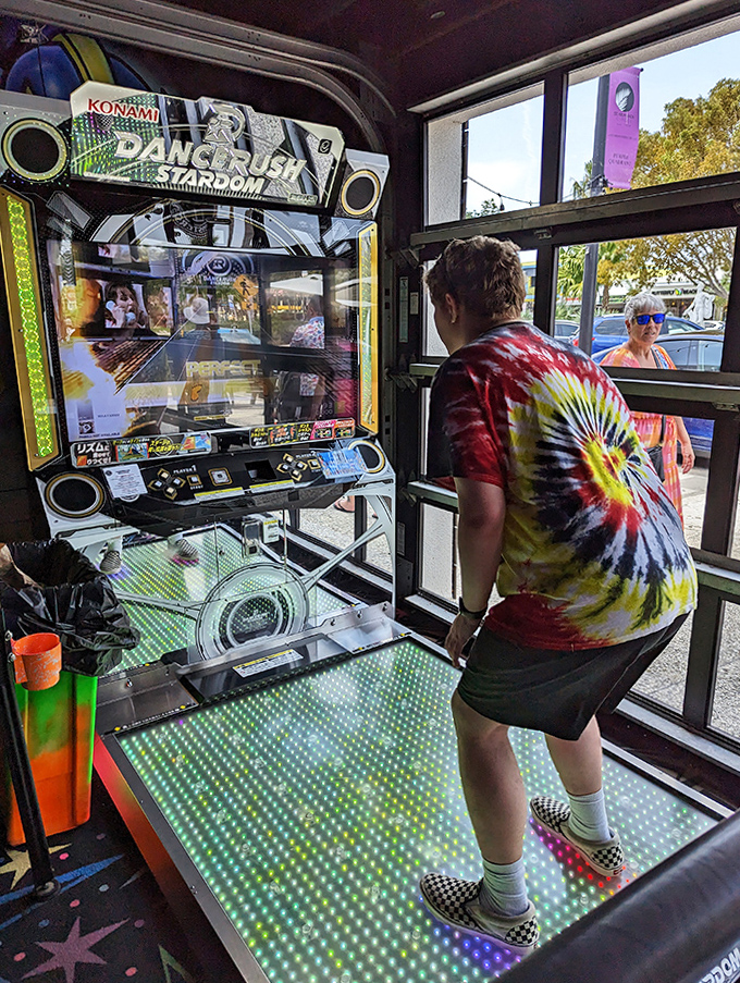 Dance games aren't just about rhythm &ndash; they're impromptu performance art that transforms shy gamers into temporary celebrities as onlookers gather to watch.