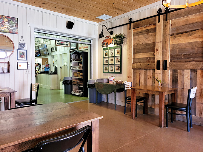 Rustic wooden tables and barn-door accents create a dining space where comfort food tastes even better, like eating in a Pinterest board come to life.