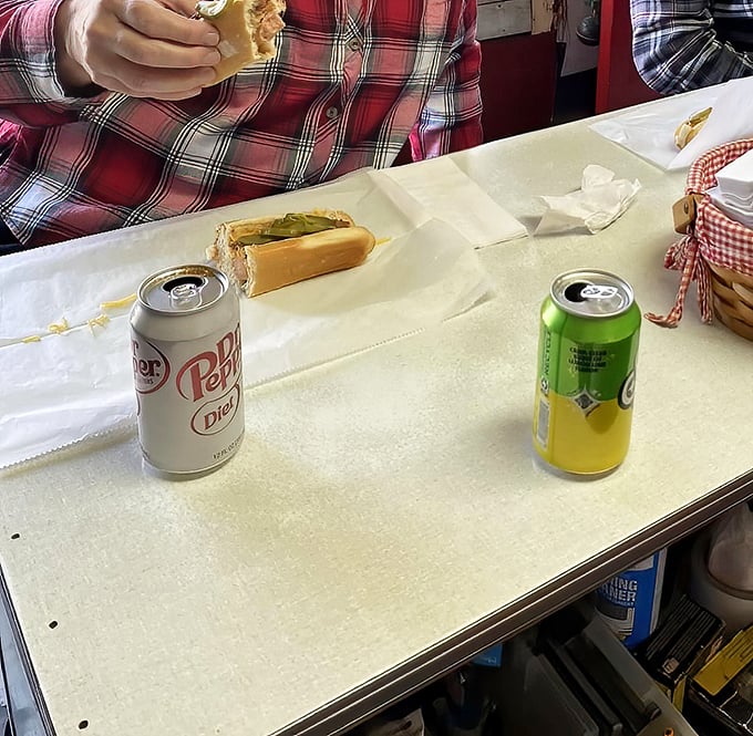 Simple pleasures in aluminum form&mdash;ice-cold canned sodas, the perfect companions to Remo's legendary dogs.