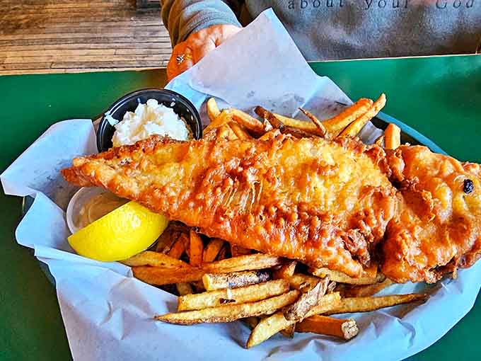 Golden-battered fish with a satisfying crunch gives way to flaky, tender white fish inside &ndash; a plate that could make even the mounted fish on the wall jealous.