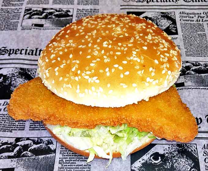 A fish sandwich that would make coastal seafood shacks nervously look over their shoulders. Crispy on the outside, flaky within, and impossibly fresh.
