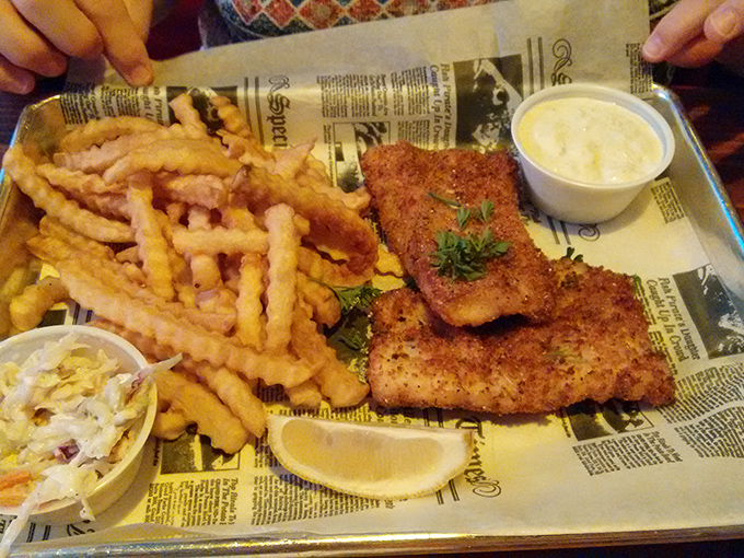 Fish and chips done right &ndash; crispy, golden batter surrounding flaky white fish with a side of perfectly cooked fries.