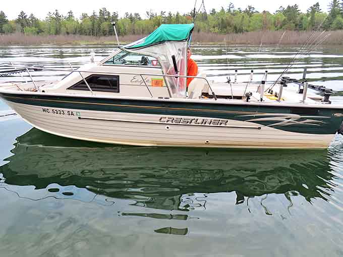 This fishing boat knows what's up, cruising these pristine waters where the fish are plentiful and the stress is nonexistent.