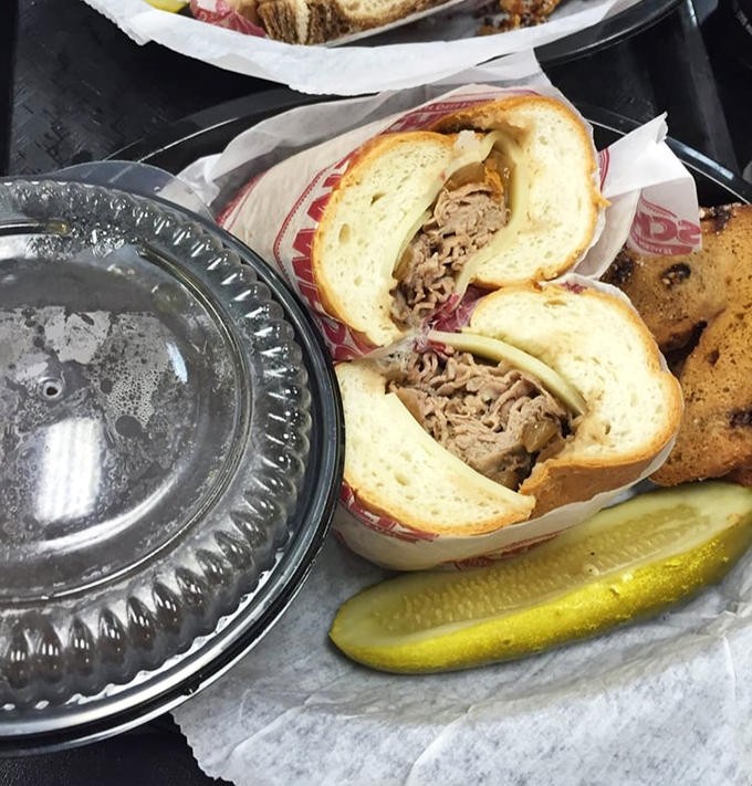 The French Dip: where thinly-sliced roast beef meets crusty bread, with a side of au jus for that perfect dunk.