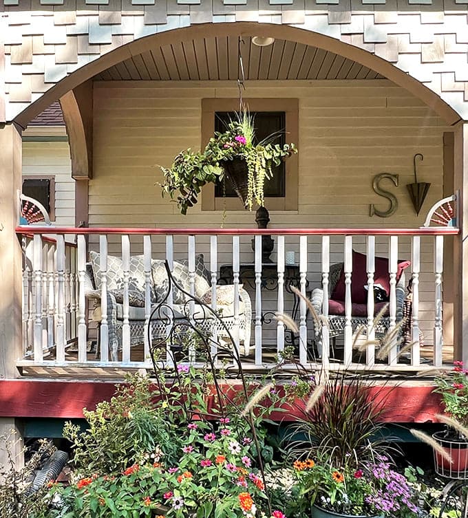 Porch sitting elevated to an art form – this inviting front veranda offers the perfect perch for morning coffee or evening contemplation.