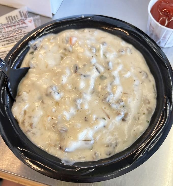 Creamy wild rice soup loaded with tender grains and vegetables, perfect for warming your soul on a chilly Minnesota day.