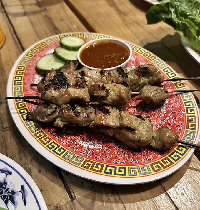 Grilled pork skewers with charred edges and juicy centers, proof that food on sticks is one of humanity's greatest inventions.