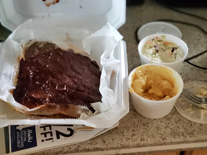 Like unwrapping a delicious present, these glistening ribs arrive with creamy sides that complete barbecue perfection.