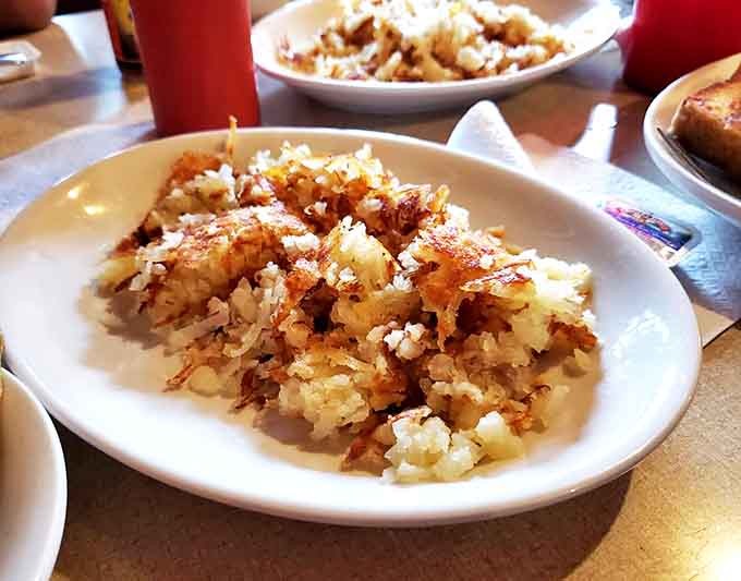 These aren't just hash browns &ndash; they're crispy potato masterpieces that have achieved the perfect balance of golden exterior and tender interior. Poetry on a plate.