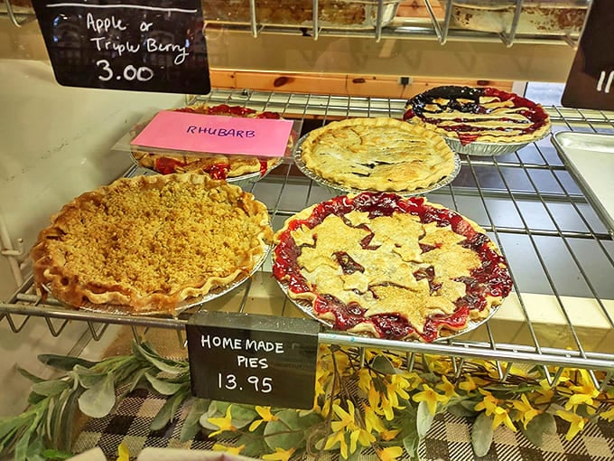 Life-changing decisions await at the dessert counter, where homemade pies with flaky crusts and perfect fillings make choosing just one slice nearly impossible.