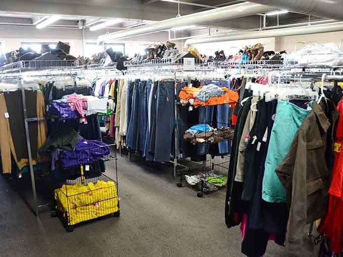 Racks of clothing organized by color create a rainbow effect that makes finding your next favorite outfit actually enjoyable instead of exhausting.