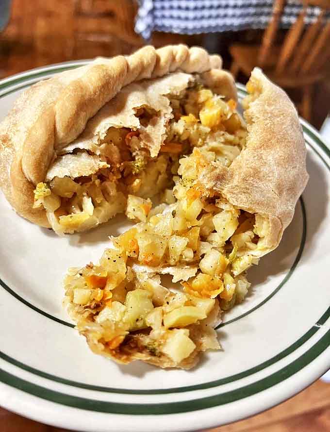 Peek inside the vegetable pasty and discover a perfectly seasoned medley of diced potatoes, rutabaga, onions and carrots &ndash; comfort food at its finest.