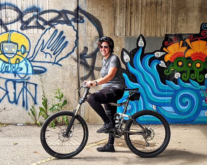 Cyclists discover the joy of seeing Lansing at the perfect pace &ndash; fast enough to cover ground, slow enough to appreciate the artistic touches.