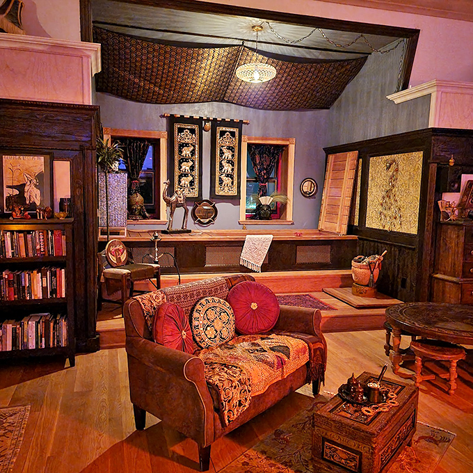 Victorian maximalism at its finest, where every surface gets decorated and blank walls are considered a missed opportunity for more pattern.