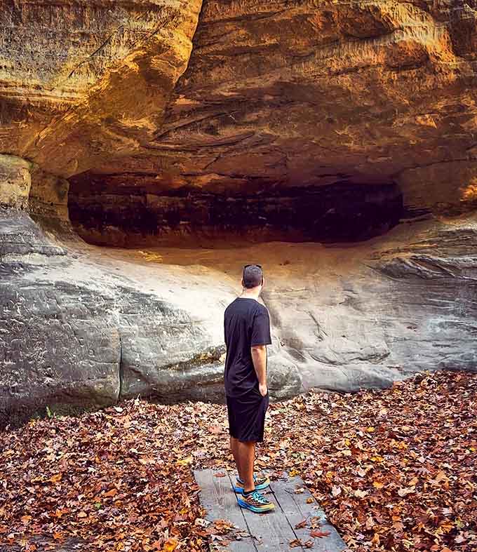 These cave-like formations invite exploration while the waterfall provides the perfect soundtrack for your inner adventurer.