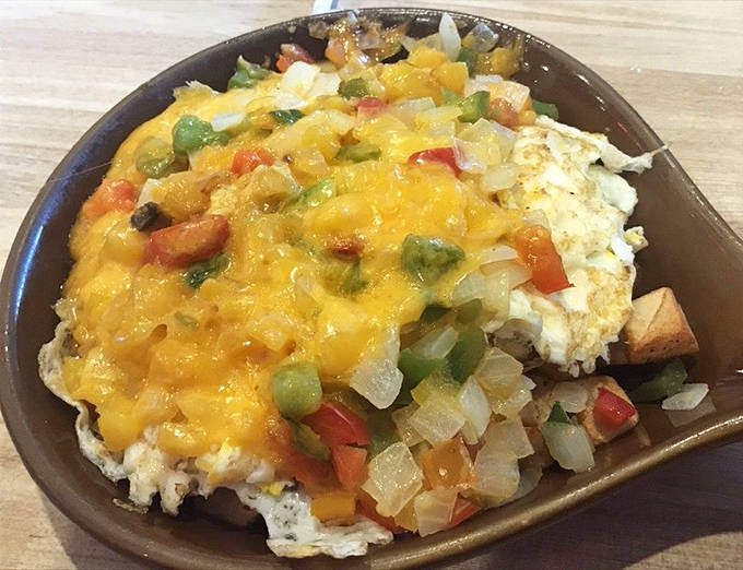 The vegetarian skillet proves that meatless can be magnificent &ndash; a colorful medley of fresh vegetables and melted cheese that even carnivores secretly covet.