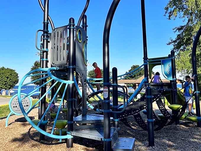 Modern meets nostalgic at Harrisville's lakeside playground, where children's laughter provides the perfect soundtrack to summer afternoons by the water.