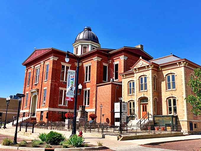 The Old McHenry County Courthouse stands proud with its classic dome and columns, now serving as a cultural center rather than a hall of justice.
