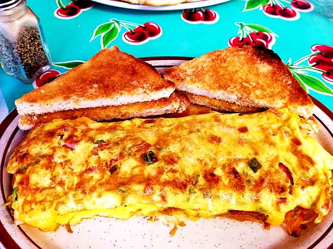 This isn't just an omelet &ndash; it's a masterpiece of morning engineering, with cheese that stretches like it's auditioning for a commercial.