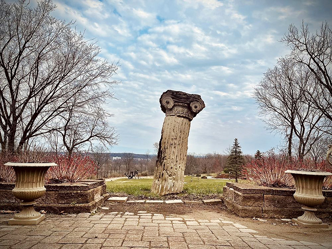 This towering sculpture reaches for the sky like it's trying to high-five the clouds, and honestly, who can blame it?