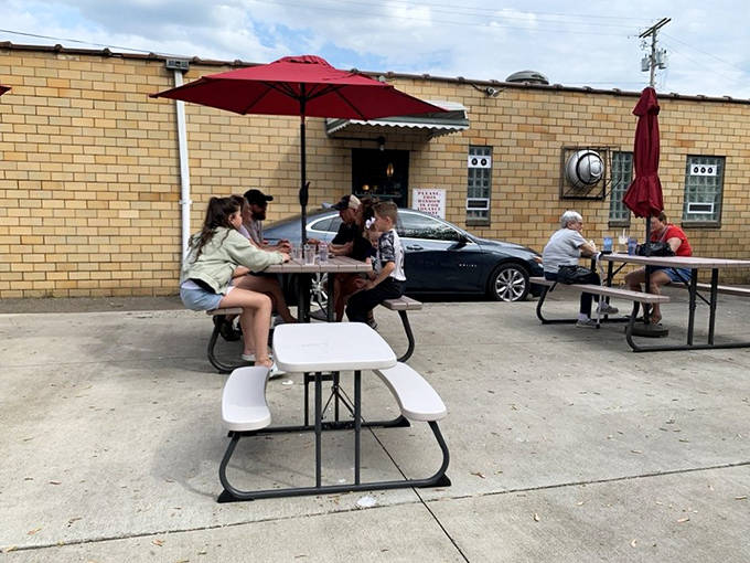 The outdoor patio offers a front-row seat to small-town America, where ice cream and conversation are still the best entertainment.