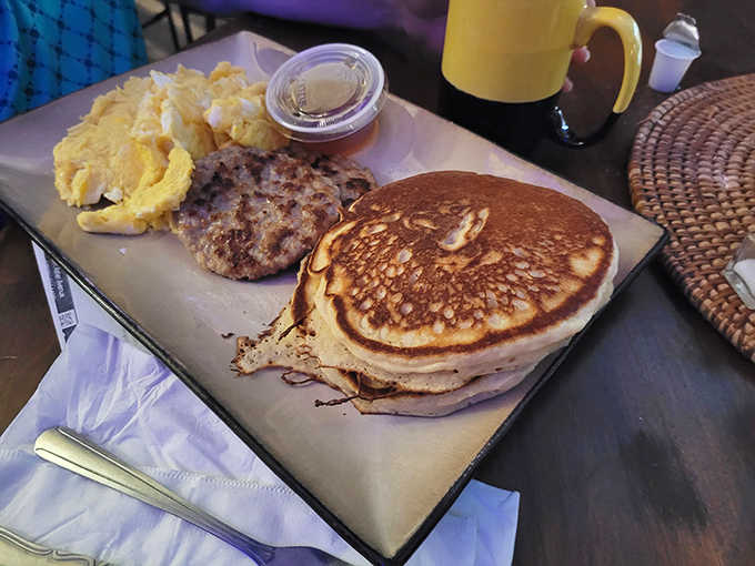 Pancakes that deserve their own zip code arrive with all the fixings, proving that breakfast can indeed be both art and science.