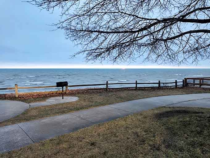 Winding pathways invite exploration along the shoreline, where every turn reveals another perfect spot to pause and breathe.