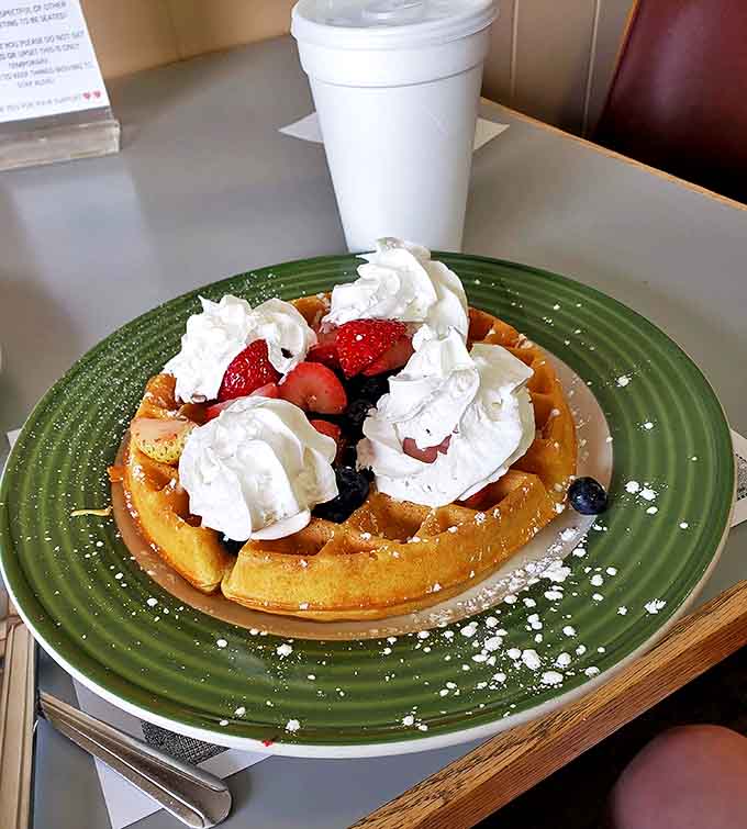 A waffle that's dressed for success with fresh berries and whipped cream. It's the breakfast equivalent of putting on your Sunday best.