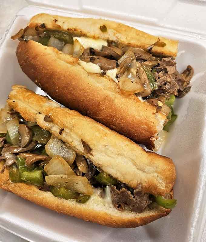 Behold the sandwich that launched a thousand road trips &ndash; thinly sliced steak, melted cheese, and saut&eacute;ed veggies on a roll that's just the right amount of chewy.