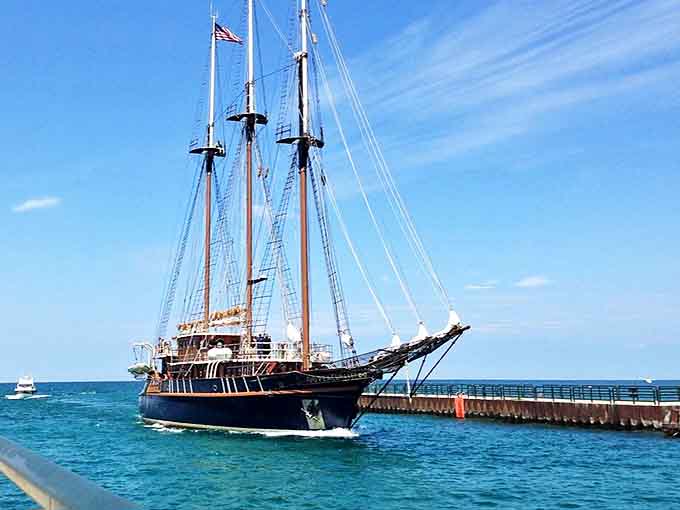 This majestic tall ship glides through Charlevoix's channel like a time traveler from the golden age of sailing.