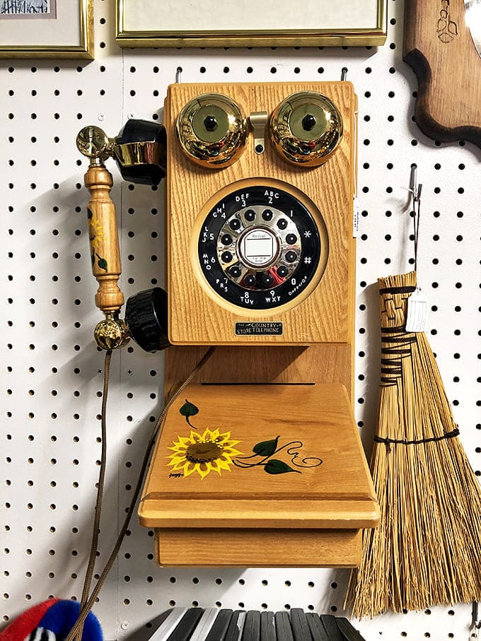Before smartphones ruled our lives, this wooden wall phone with its cheerful sunflower connected households to the outside world. No charging cable required!