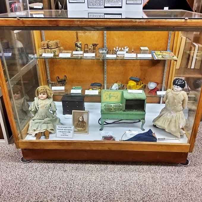 Porcelain dolls with their haunting expressions remind us that even in hardship, children found joy in play.