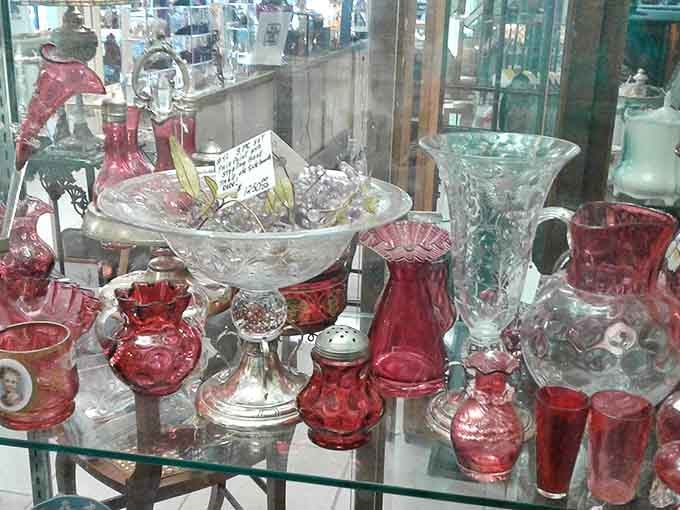 Cranberry glassware glows with rich ruby tones, a collection that would make any dinner party feel like a special occasion from another era.