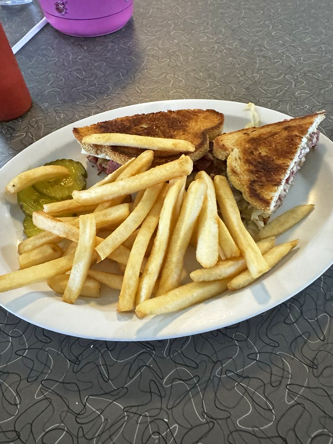 The Reuben sandwich &ndash; an architectural marvel of corned beef, sauerkraut and melted Swiss that defies both gravity and expectations.