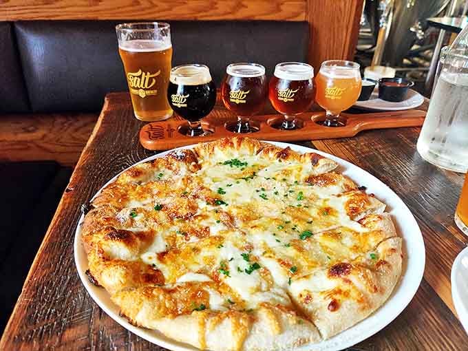 Perfectly melted cheese on a thin, chewy crust – proof that simplicity, when executed flawlessly, can be divine.