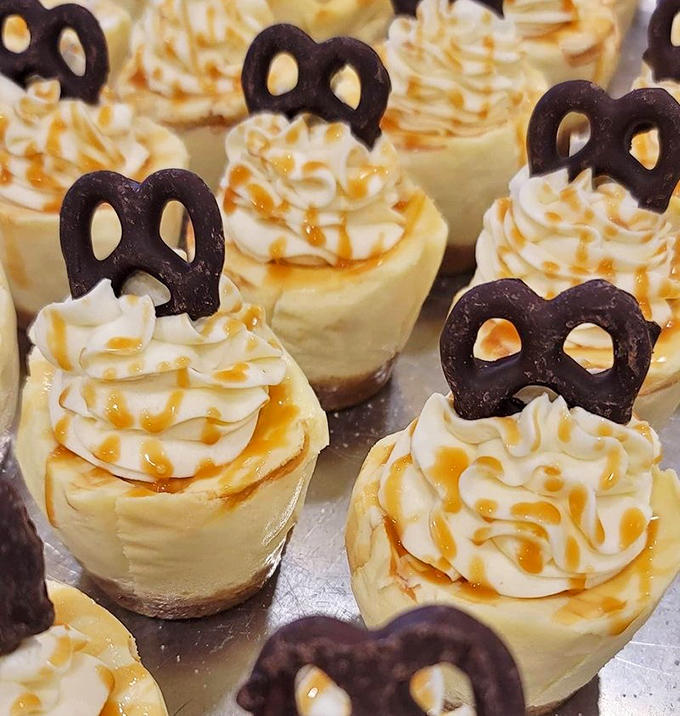 Salted caramel cheesecakes topped with chocolate pretzels &ndash; because sometimes sweet and salty need to stop fighting and just get along already.