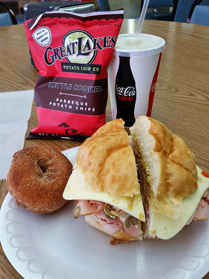 Lunch of champions: a hearty sandwich on fresh-baked bread, paired with kettle chips and a donut chaser for dessert.