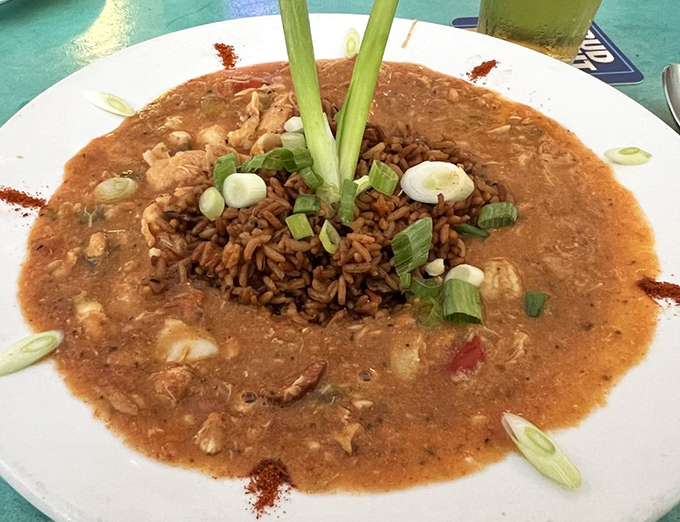 Seafood gumbo that could make a Louisianan tip their hat &ndash; a spicy, rich celebration with rice island rising from the center.